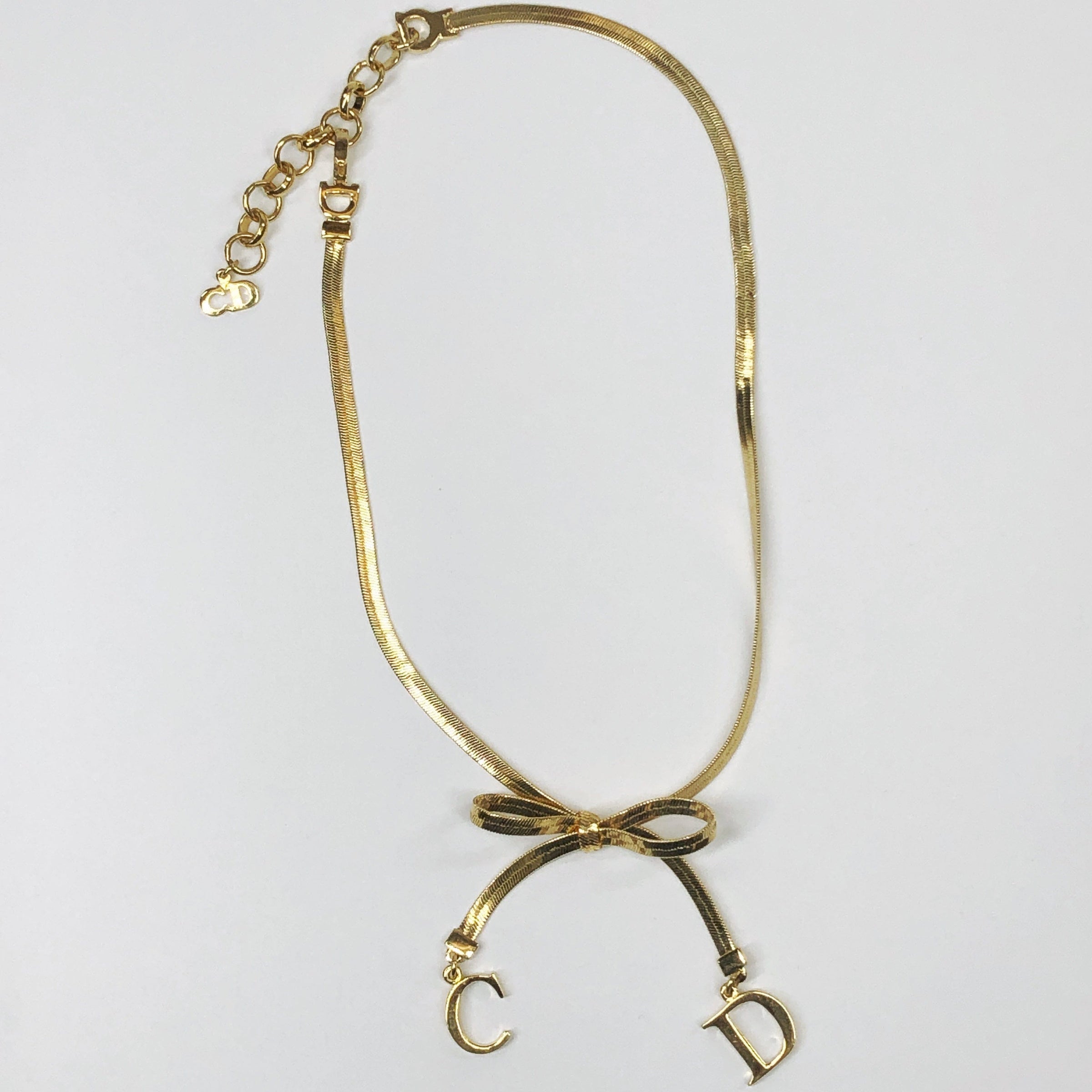 Dior Ribbon X Logo Necklace – LuxuryPromise